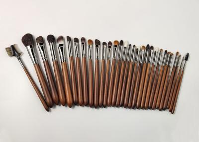 Cina Il punto culminante cosmetico sintetico di Taklon dell'alto grado ha affusolato la polvere di trucco spazzola la fabbrica creativa della Cina degli strumenti di trucco in vendita