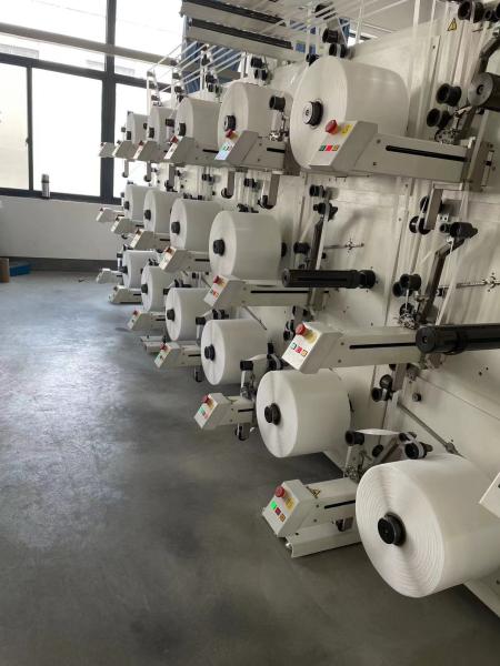Quality Adjustable Speed Diaper Hook Machine Slitting And Rewinding Machine for sale