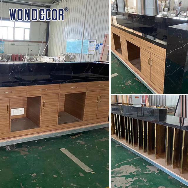 Close-up view of stainless steel reception desk