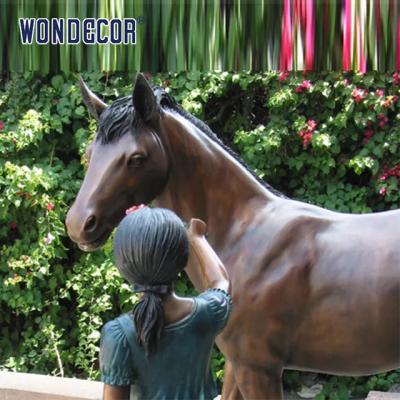 China Custom Life Size A Bronze Statue Of A Girl Playing With Her Horse Friend for sale