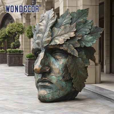China Outdoor Abstract Art Bronze Sculpture Leaf Face Statue for sale