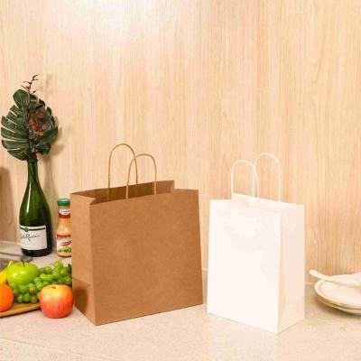 Cina Sacchetti della spesa amichevoli 100% di carta kraft di vendita al dettaglio del mestiere di Eco FSC con la maniglia di rinforzo in vendita