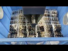 Seasoning package stacking machine automatically and neatly stacks without manual stacking