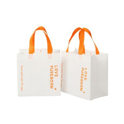 China Wiederverwendbare Bio-Recycling-Nichtgewebte Luxus-Tasche mit Logo für kundenspezifische XYDAN 3D-Hotpress zu verkaufen