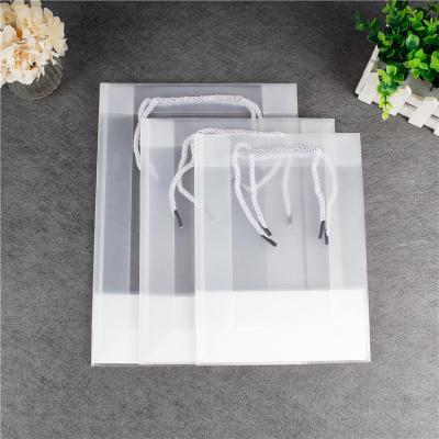China XYDAN BAG Stock Transparente PP plástico embalagem de presente bolsa de mão congelada 100% Eco Organza Saco de compras para roupas à venda