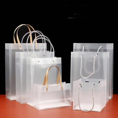 China XYDAN Frosted Rigid PVC Transparent Tote Bag mit weichem Loop-Griff gestreiftes Muster zu verkaufen