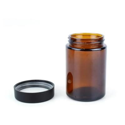 Cina Custom Honey Jars Amber Glass Candle Jars With PP Cap Airtight Screw Cap in vendita