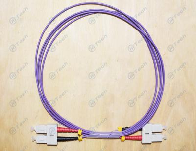 China Purple Color SC To SC Fiber Patch Cable , 50/125μM OM4 Duplex Fiber Jumper LSZH for sale