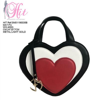 China Women handbag tote bag/crossbody bag with heart-shaped fashion style for sale
