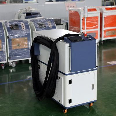 China 1000w Laser Cleaning Machine for Rust Removal using Raycs Laser Source and 100kg Weight for sale