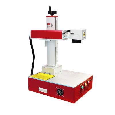 China 30 KG Portable Fiber Laser Marking Machine for Mini Rotary Medals and Dog Tages Engraving at Manufacturing Plant for sale