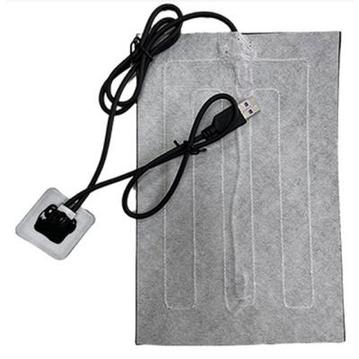 Cina Termoforo flessibile 5v a batteria 14x21cm con interruttore in vendita