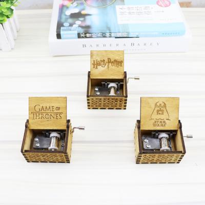 China Wholesale unique Hand-crank Harry Potter Wooden Music Box for sales for sale