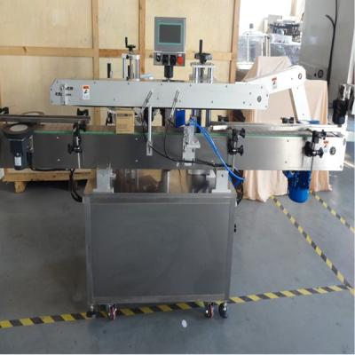 China Aluminum virgin coconut oil bottle with dropper labeling machine for sale