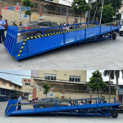 China 10 Meters Custom Moveable Loading Dock 10 Tons Fixed Height Mobile Forklift Ramp for sale