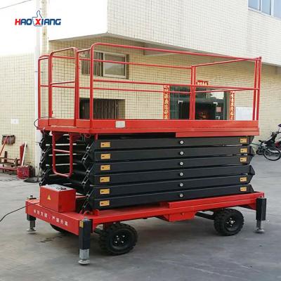 China Indoor Self Propelled Scissor Lift 1.5 Ton Mobile Scissor Platform for sale
