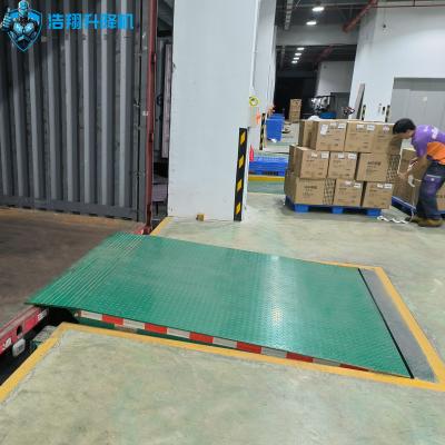 China Carregamento e descarregamento de cargas de contentores nivelador hidráulico 10T plataforma de carregamento de contentores à venda
