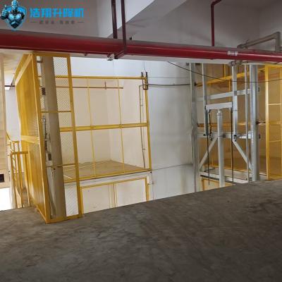 Cina 6m Elevatore giallo di magazzino 20000kg di magazzino di merci Elevatore personalizzato in vendita