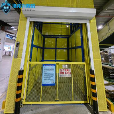 Cina 7 tonnellate 10 m di altezza giallo personalizzato 500 kg-20000 kg grande ascensore idraulico per il trasporto di merci industriale interno in vendita