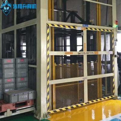 Cina 5 tonnellate 8 m di altezza Bianco personalizzato 500-20000 kg Grande ascensore idraulico per il trasporto di merci industriale interno in vendita