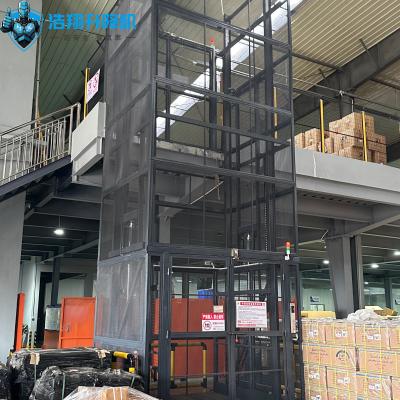 China Ascensor de dos pisos negro 2T 5M para carga y descarga de mercancías en fábrica o almacén en venta