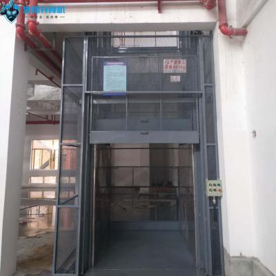 China Heavy Duty Pallet Cargo Lift Elevator 5000kg Hydraulic Freight Platform With Vertical Mechanism for sale