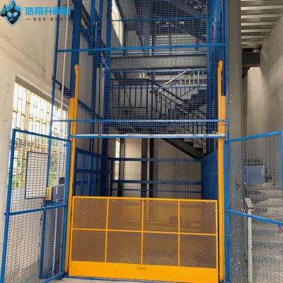 China Hydraulic 2 Ton Cargo Freight Elevator Chain Lift Platforms Warehouse Load Hoist for Construction for sale