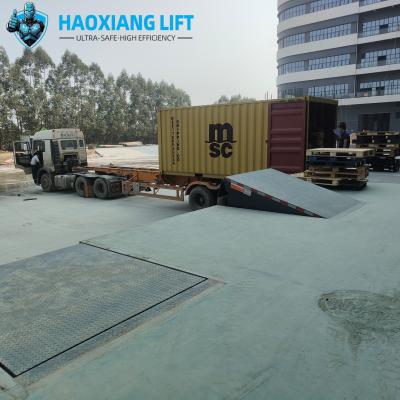 중국 유압식 도크 레벨러 블루 - 고강도 높이 맞춤형 - 8T-20T 유통용 피트 불필요 판매용