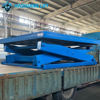 China Fixed Hydraulic Scissor Lift with Rollers -0.8T-12T, robust, roller-facilitates loading/unloading, simple operation, high-strength steel, industrial-grade reliable for sale