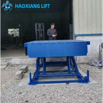 China Industrial-Grade Reliable Fixed Hydraulic Scissor Lift  - Roller-Assisted Loading/Unloading for sale