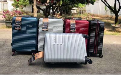 中国 アルミフレーム ハードサイドローリングジッパー フライトケース OEM ODM カスタムラベル アンチ・スクラッチ 旅行用荷物 スーツケース 販売のため