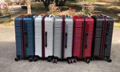 中国 アルミフレーム ハードサイドローリングジッパー フライトケース OEM ODM カスタムラベル アンチ・スクラッチ 旅行用荷物 スーツケース 販売のため