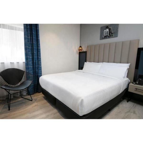 Quality Sadie Best Western Hotel Liquidates Wholesale Wood Furniture for Guest Rooms Wardrobe Bed Base & Sofa for sale