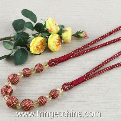 China Delicate custom long tassel fringe trimming for curtain attractive tieback hanging ball for sale