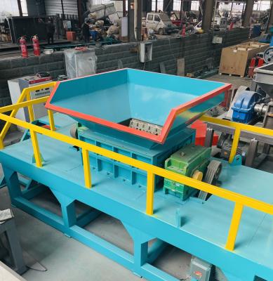 China Multifunctional Twin Shaft Hob Shredder for Old Leather Waste Textile and Fishing Net for sale