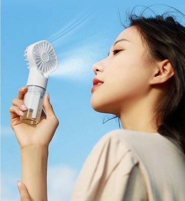 China Portable Mini Handheld Fan 4 Speed Settings Rechargeable and 2-8 Hours Working Time for sale