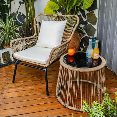 China Modern Simple Wicker Kitchen & Garden Outdoor Furniture Set with Large Armchairs Rattan Table Eco-Friendly Waterproof Design for sale