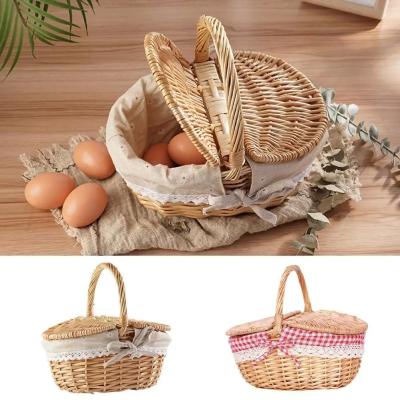 China Picnic Fruit Storage Basket With Cover Rattan Wicker Basket Easter Family Snack Container Multifunctional Hand-woven Basket for sale
