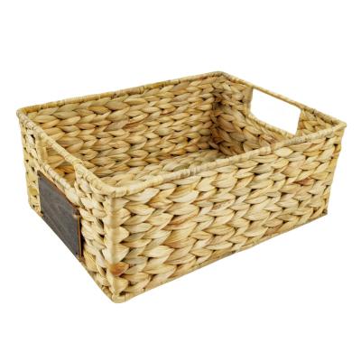China New Living Room Desktop Basket Water Hyacinth Braided Frame Storage Box Straw Cosmetics Storage Basket for sale