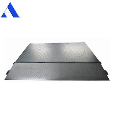 China Hydraulic Scissor Lift Container Ramp for Forklift Loading 6500Kgs Capacity and Multi-functional Design for sale