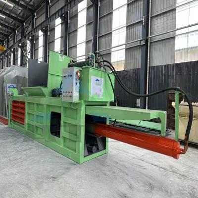 China Reciclagem de resíduos têxteis Máquina de embalagem hidráulica horizontal para compressão de garrafas à venda