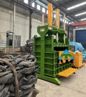 China Automatic Grade Automatic Vertical Hydraulic Rubber Tire Baler for Packaging for sale