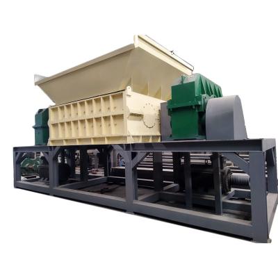China 50kW dubbele schacht versnipper voor plastic flessen vrachtwagenbanden en metaalschroot recycling Te koop