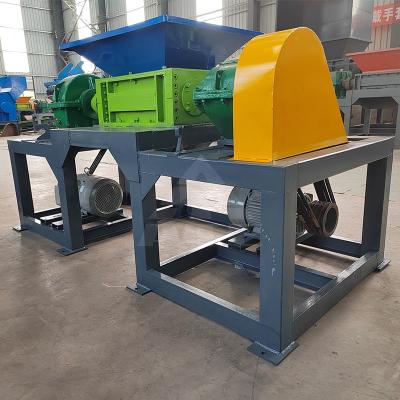中国 プラスチックボトル金属と紙ゴミのスクラップのためのダブルシャフトスクラッダーマシン 販売のため