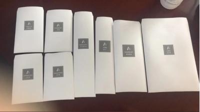 China Carta di pietra su misura che imballa per la borsa sanitaria dell'hotel eliminabile for sale
