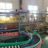 China Plastic Bottle Carton Case Packer With Drop Down Free Down System for sale