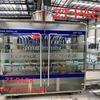 Cina Linea di imballaggio completamente automatica per riempitrice di olio commestibile per la cottura di semi di girasole Linea di riempimento per oli di arachidi in vendita