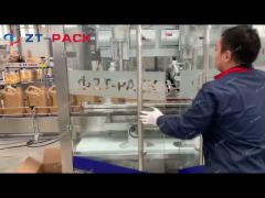 4000-5000bph μηχανή συσκευασίας πετρελαίου λιπαντικού ελαίου 6 επικεφαλής μηχανή κάλυψης επαγωγής σφραγίζοντας