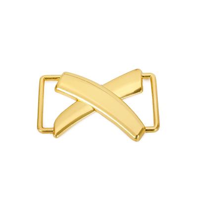 China Fechamento brilhante da bolsa da forma da cruz do metal do ouro para a decoração da bolsa à venda