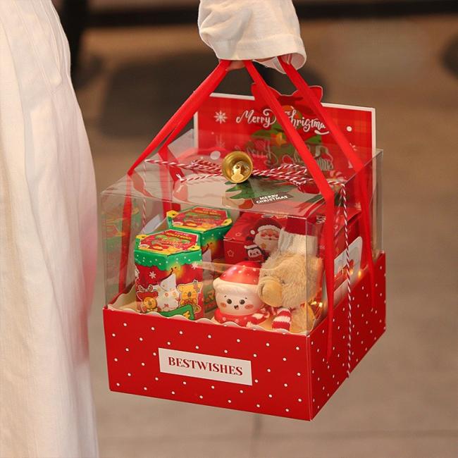 Christmas gift box with clear lid and festive contents